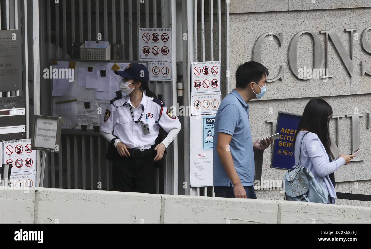 Security Guards Stand Guard In Front Of Consulate General Of The United