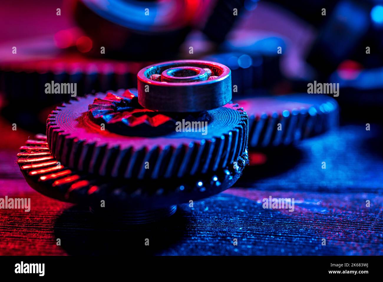 Gears. Machine part. Neon color Stock Photo - Alamy