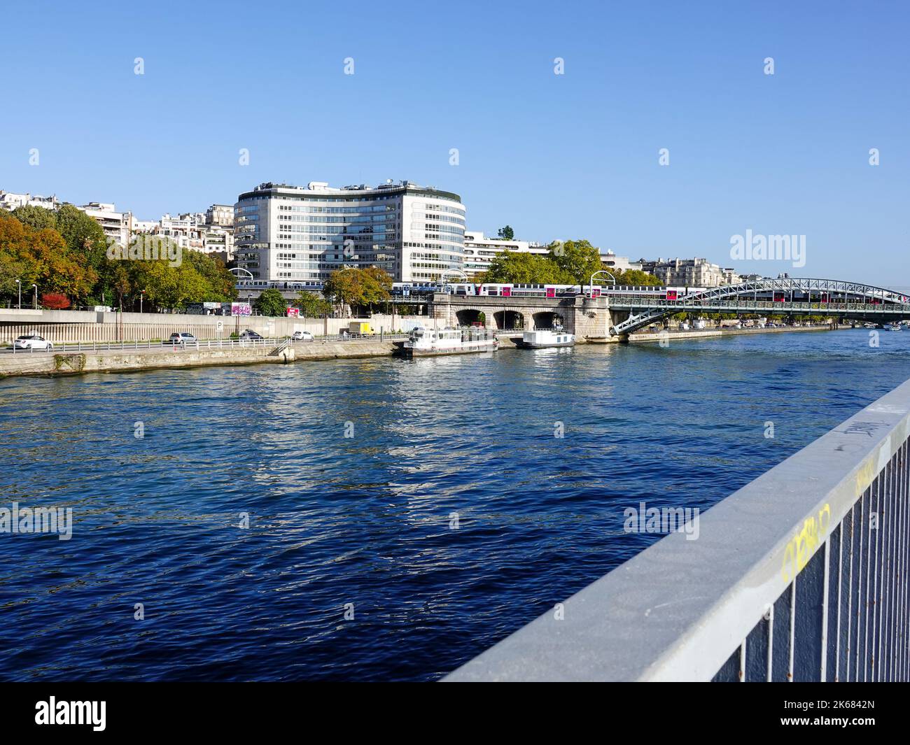 RER C local train crossing Pont Rouelle, steel bridge connecting the ...