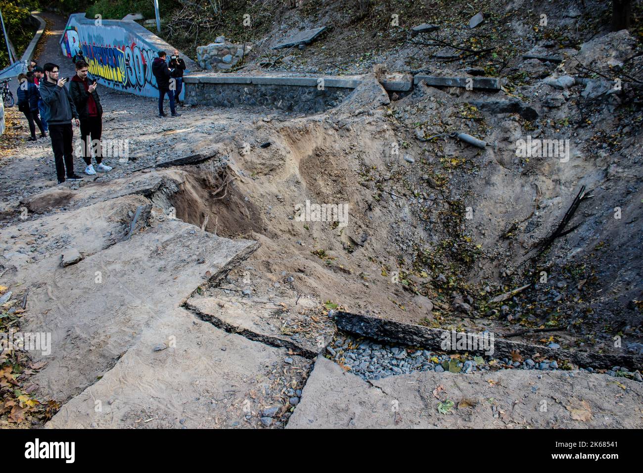 Aftermath of massive Russian missile attacks, a public garden near the ...