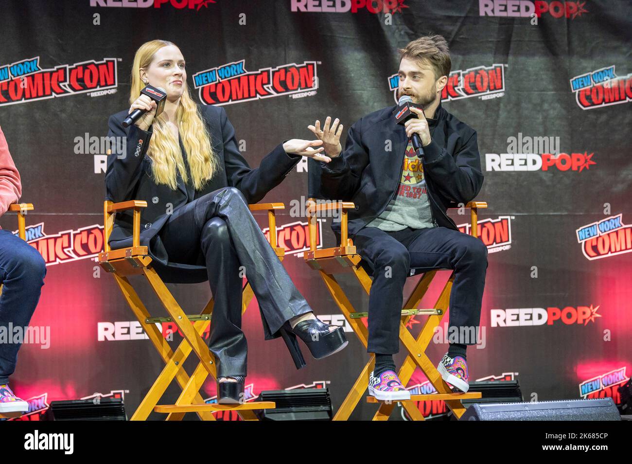 Evan Rachel Wood and Daniel Radcliffe speak on stage at Let's Get WEIRD ...