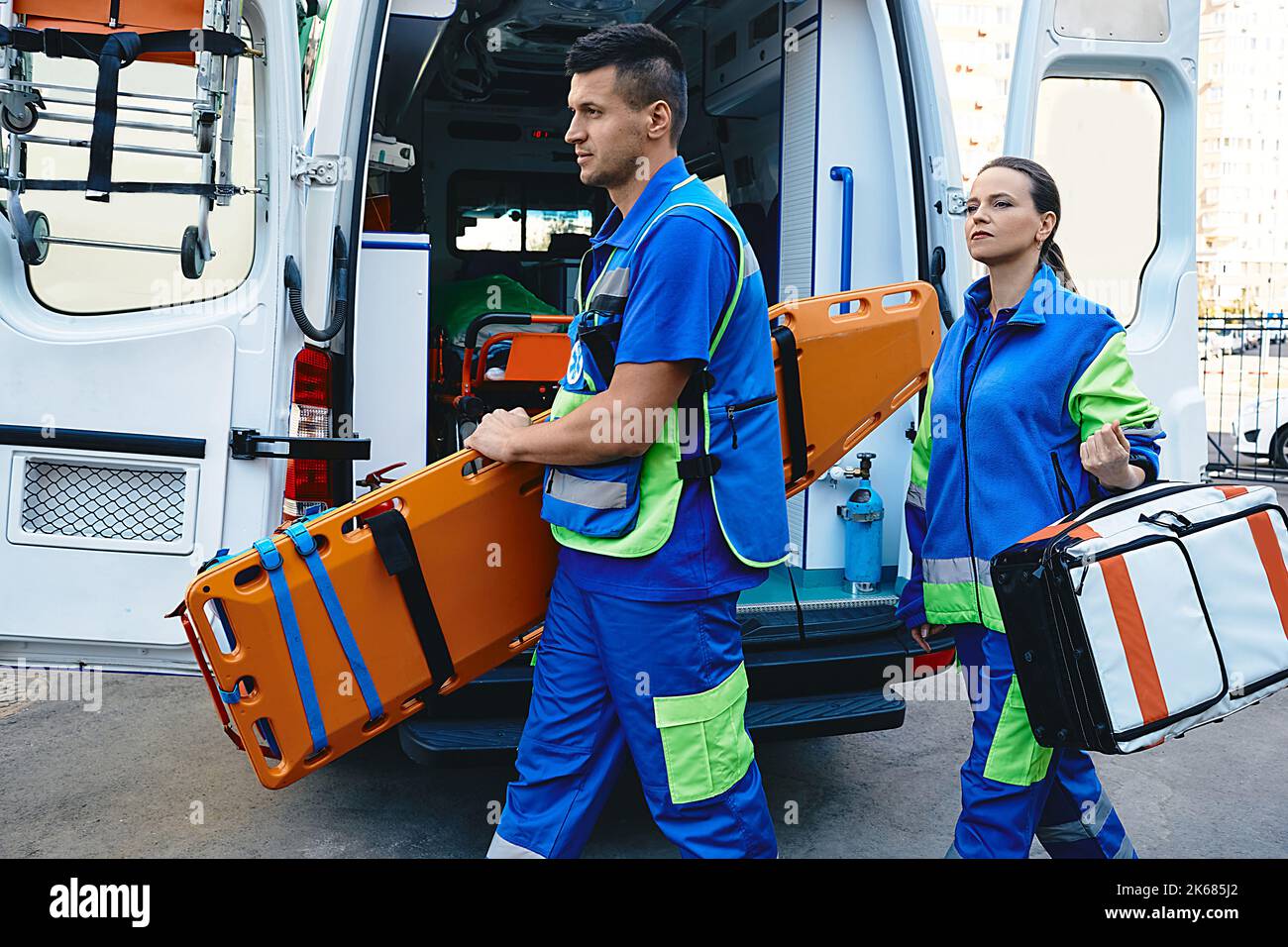Emergency medical services. Paramedics with first aid medical equipment ...