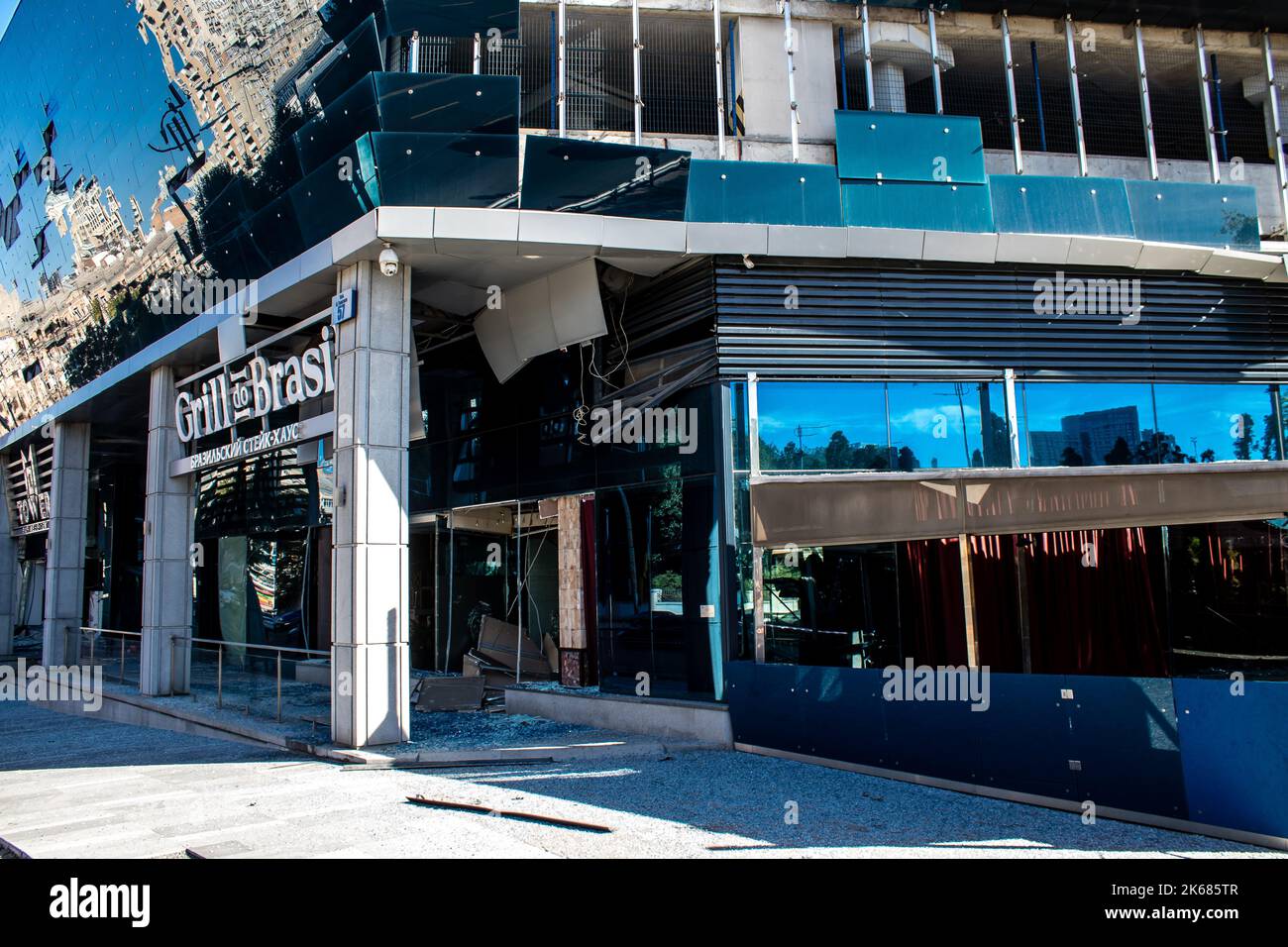 Aftermath of massive Russian missile attacks, an office building near ...