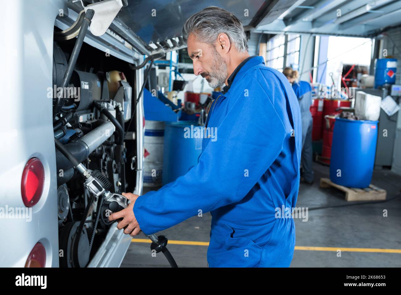 a bus mechanic at work Stock Photo - Alamy