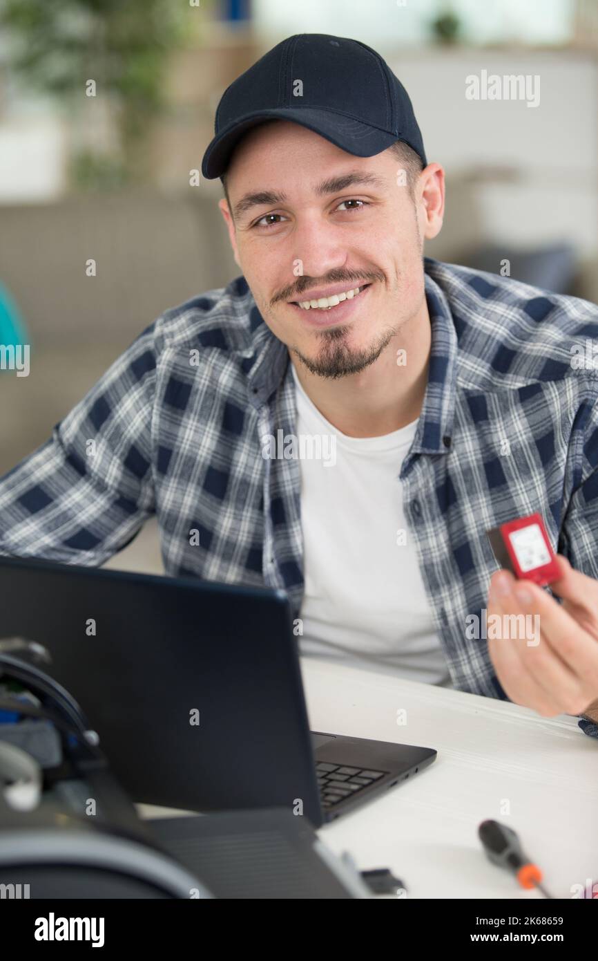 computer masters smiling at camera Stock Photo - Alamy