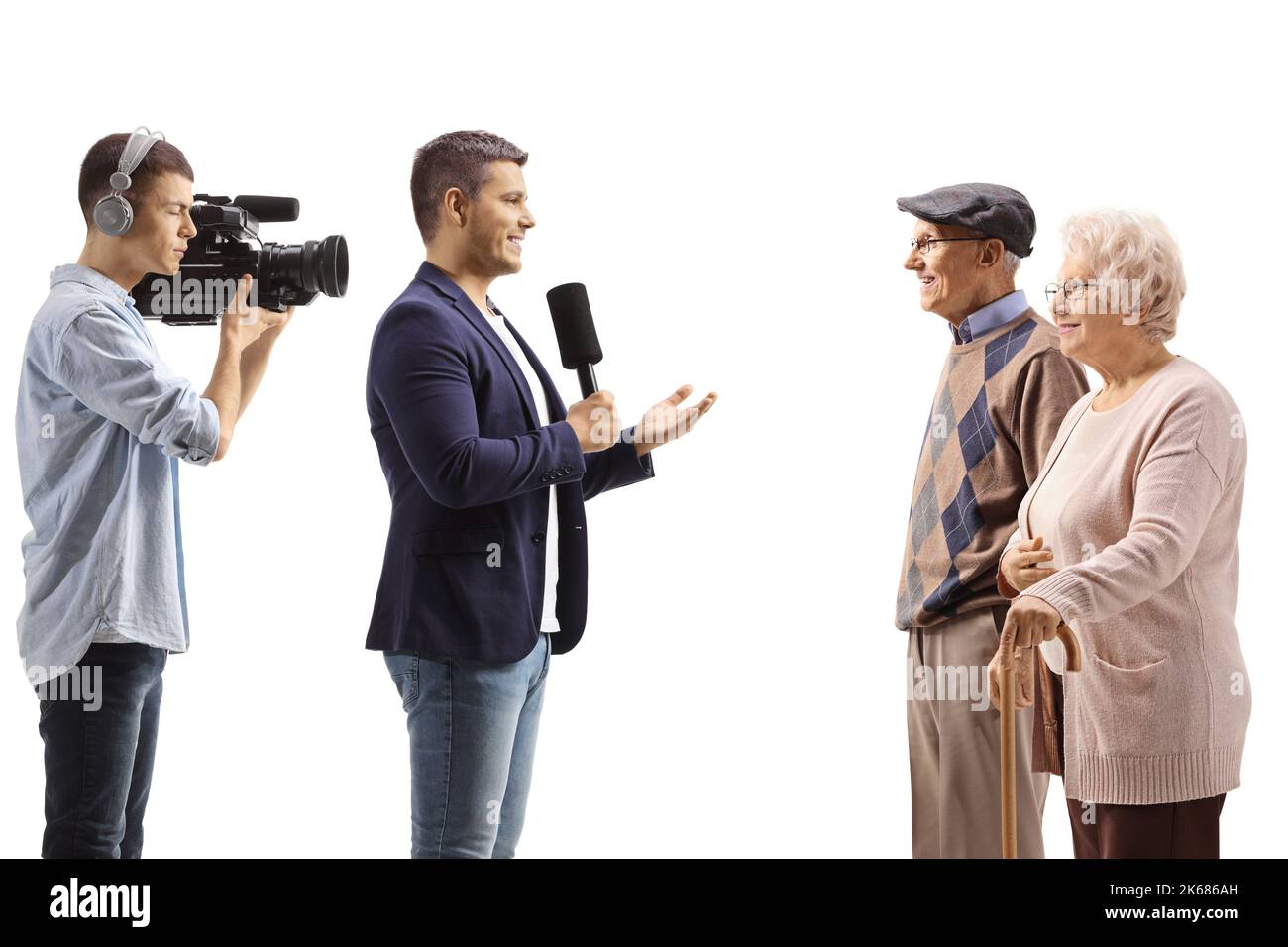 Cameraman and a reporter interviewing elderly cistizens isolated on ...