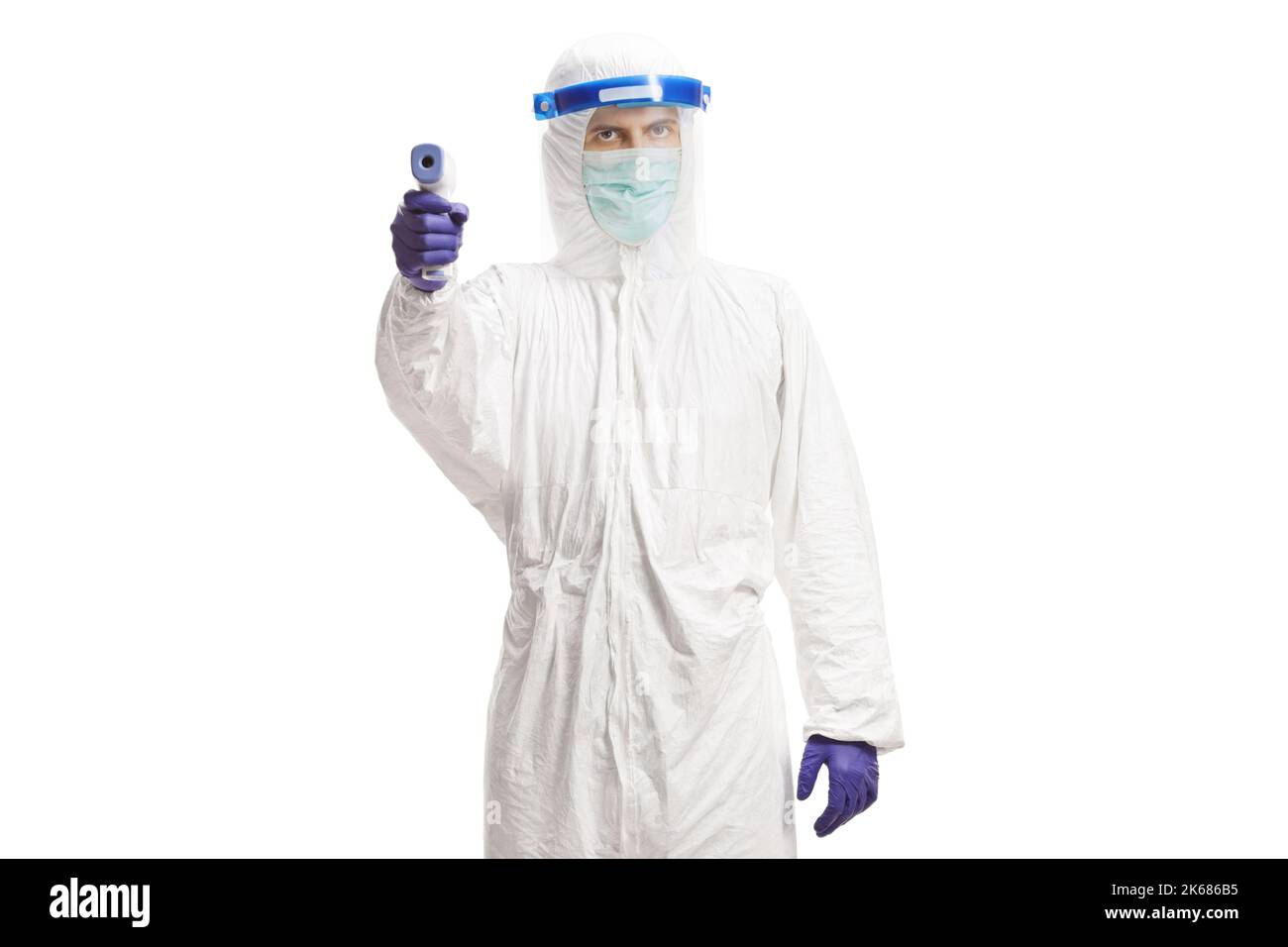 Worker in a hazmat suit measuring temperature isolated on white ...