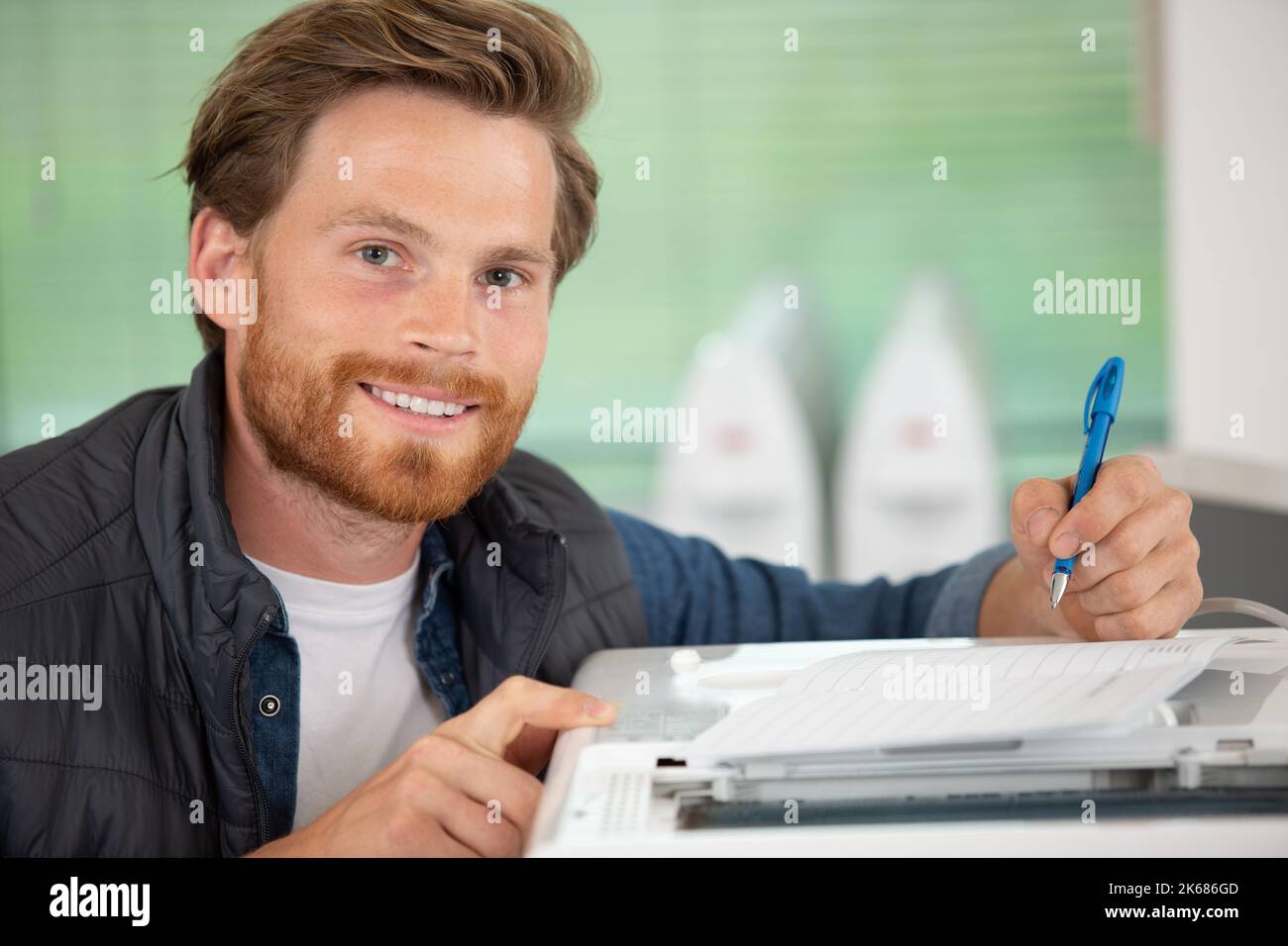 Male boss checking report on hi-res stock photography and images - Alamy