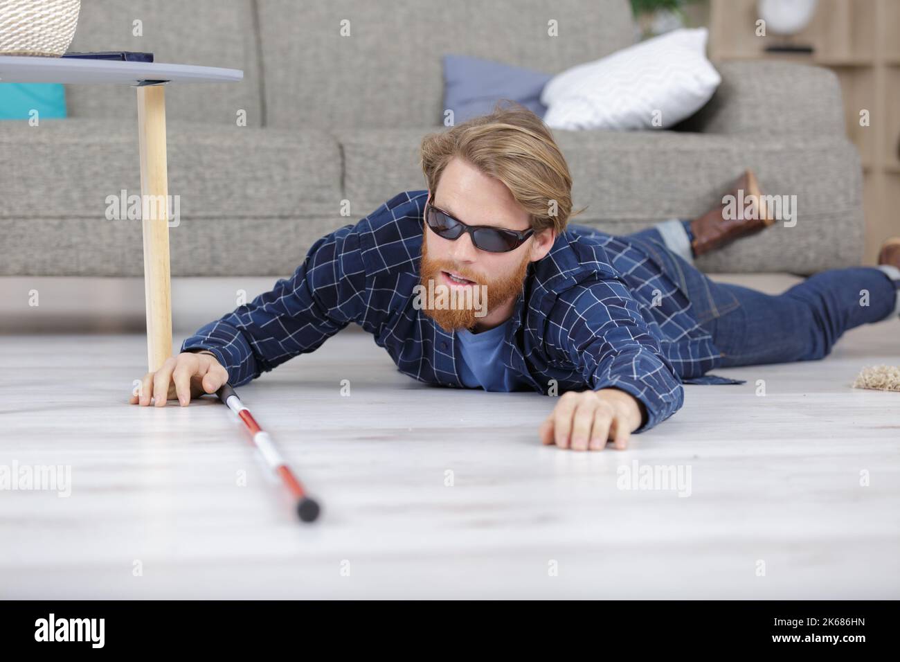 blind man fallen on the floor in his home Stock Photo - Alamy