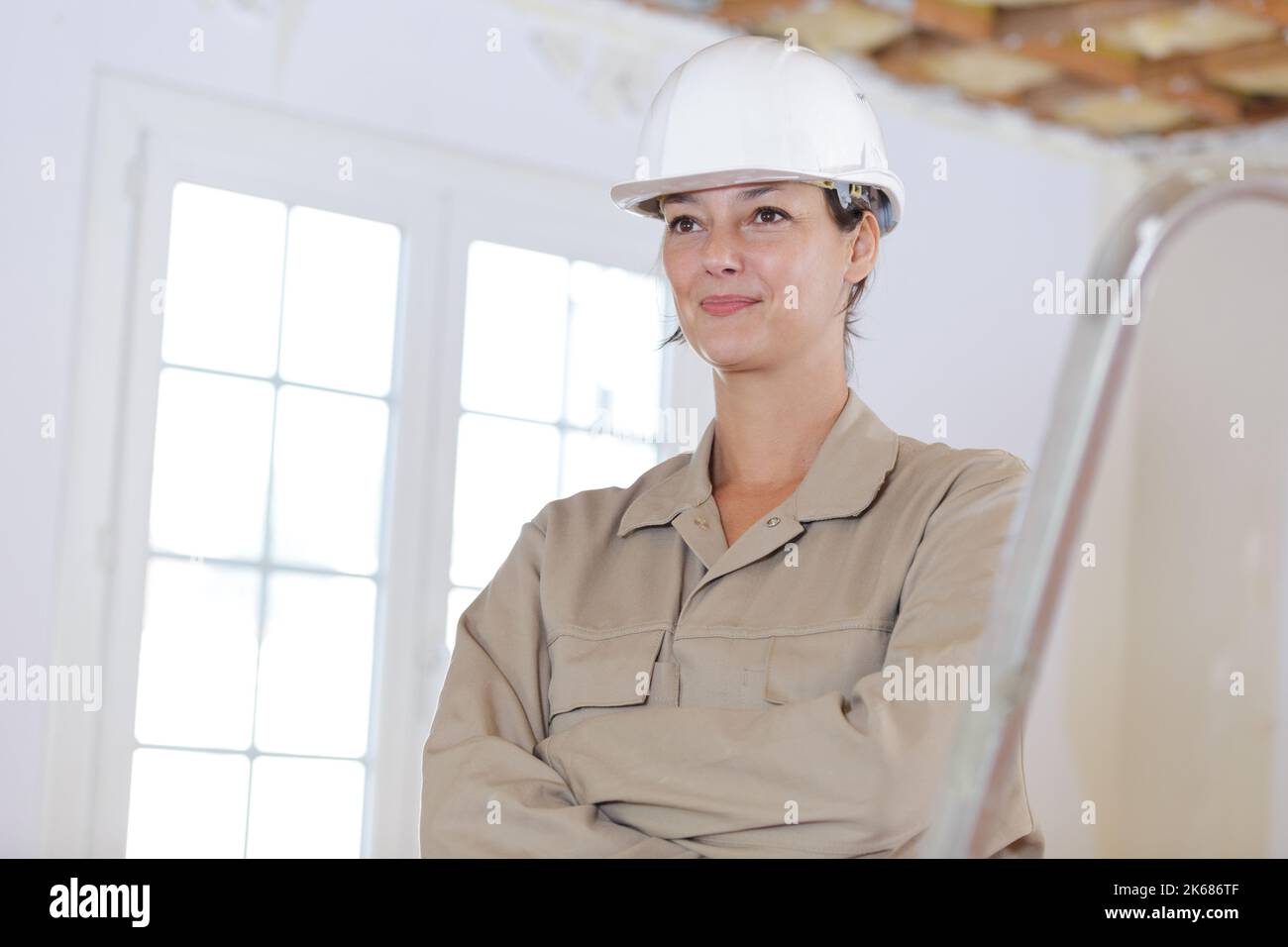 Serious woman builder posing hi-res stock photography and images - Alamy