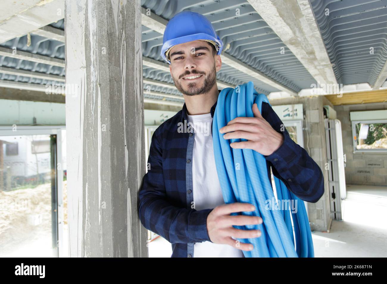 Technician holding water pipes hi-res stock photography and images - Alamy