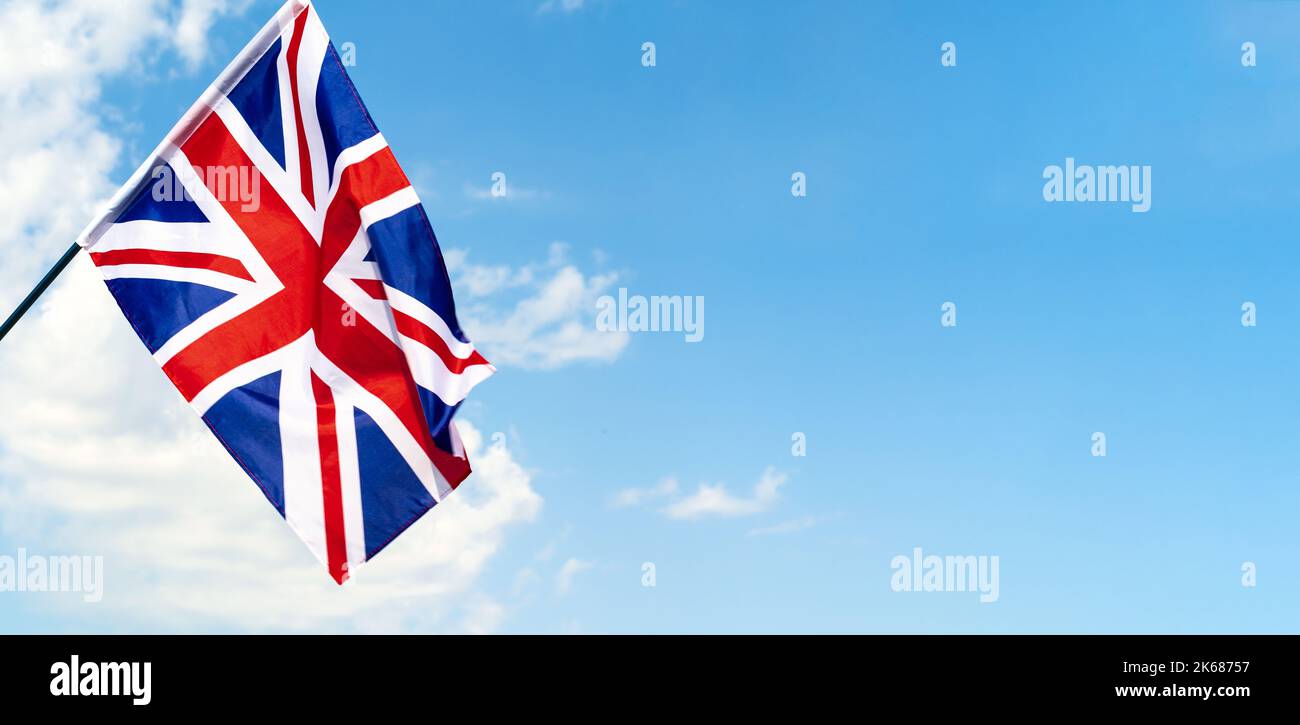 United kingdom flag waving cloud hi-res stock photography and images ...