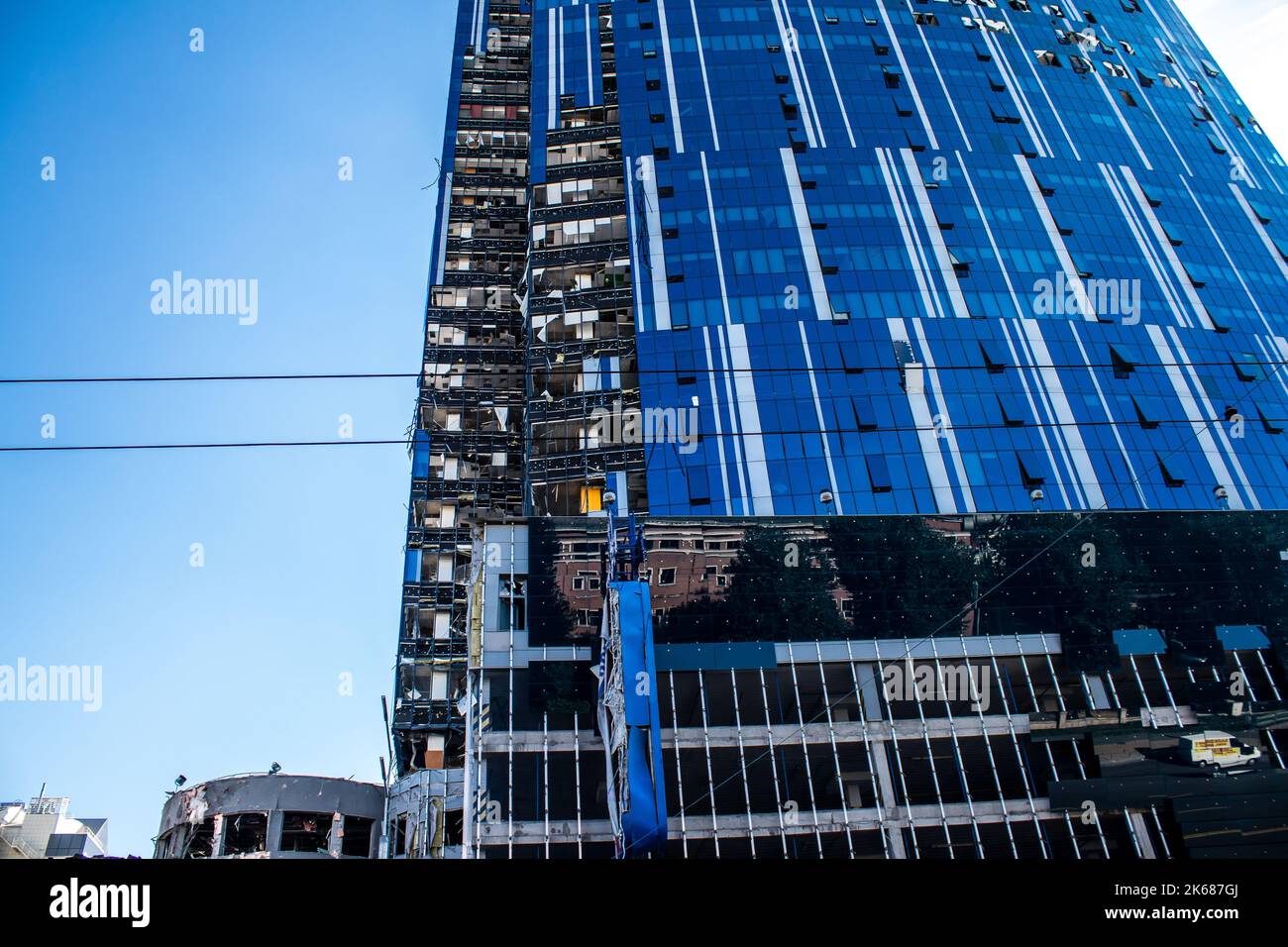 Aftermath of massive Russian missile attacks, an office building near ...