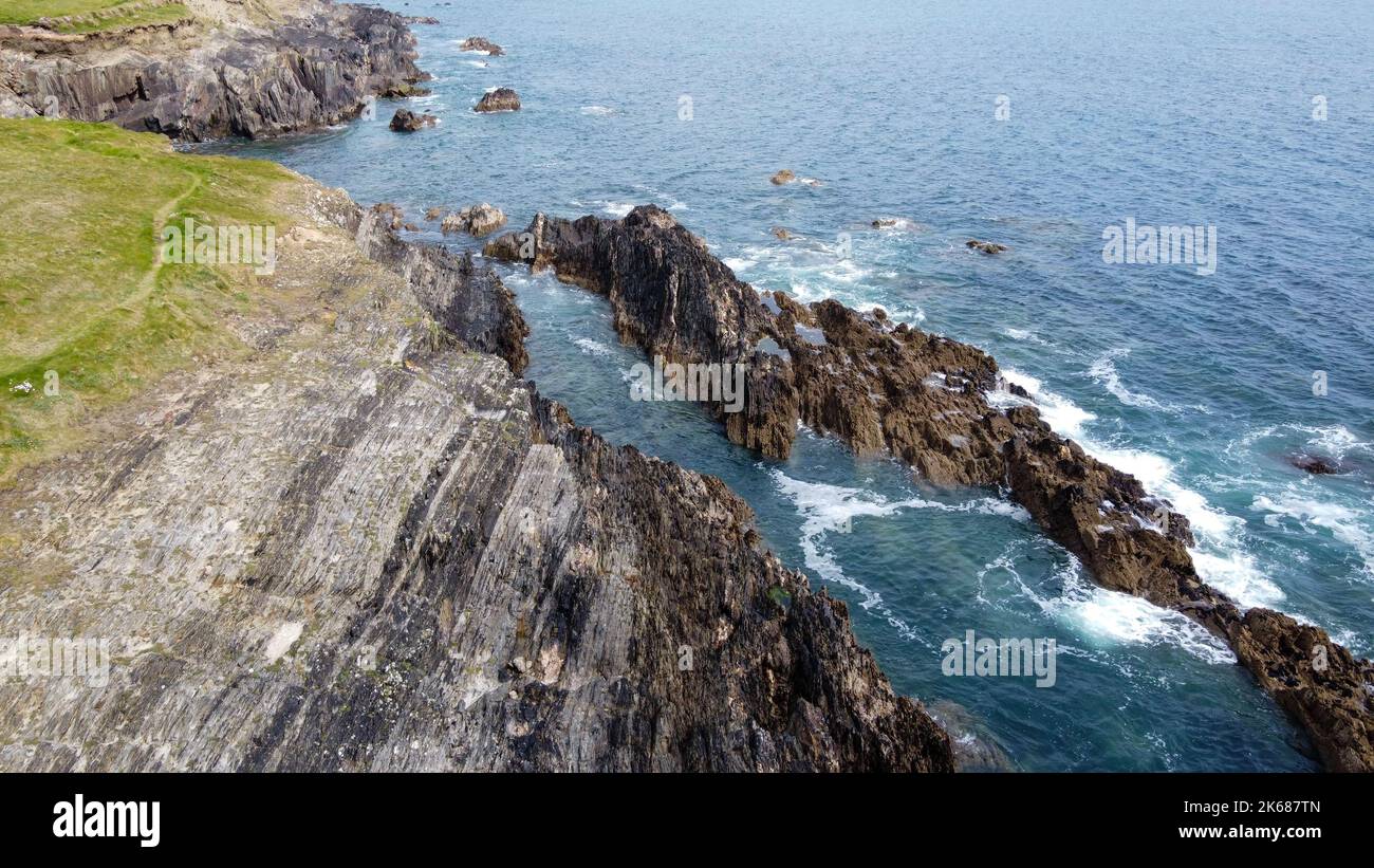 Drone point of view. Picturesque rocky coast of the Celtic Sea. White ...