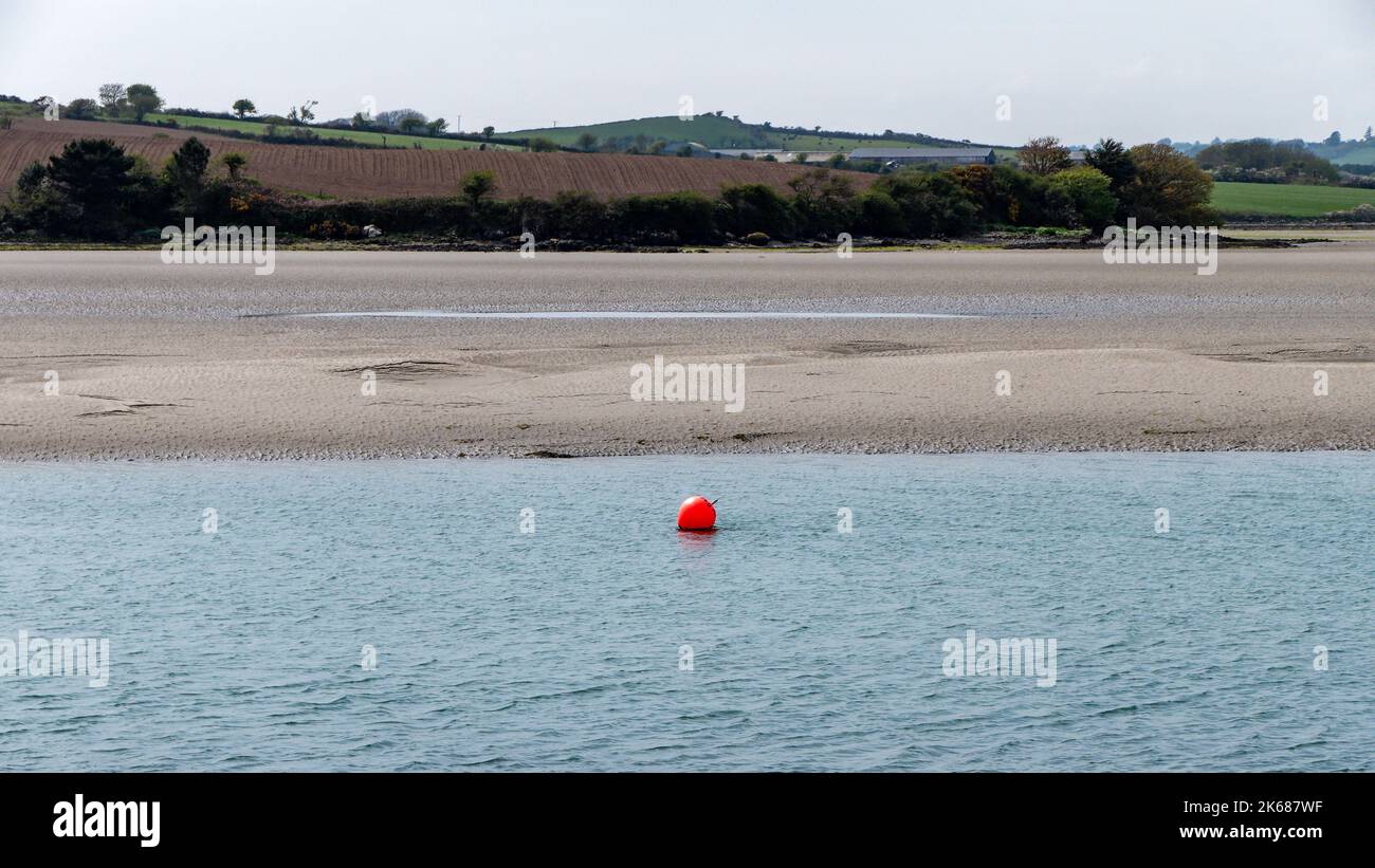 An orange sea buoy on the surface of the water. Seascape. Calm water ...