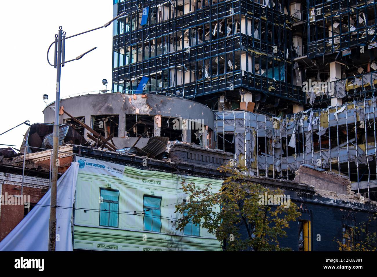 Aftermath of massive Russian missile attacks, an office building near ...