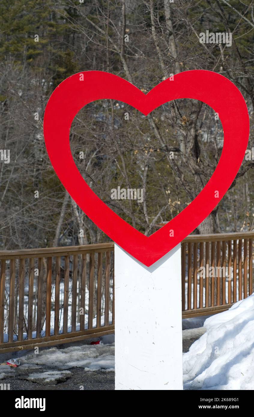 Red Heart Wood Sign at a Tourist Destination in Winter Vertical Stock ...