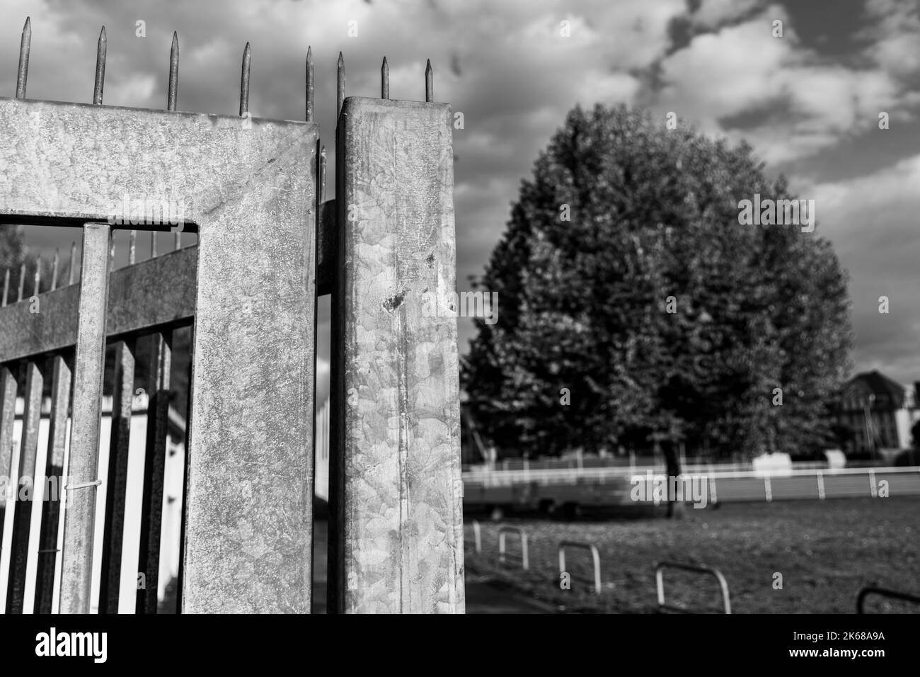 Under a fence Black and White Stock Photos & Images - Alamy