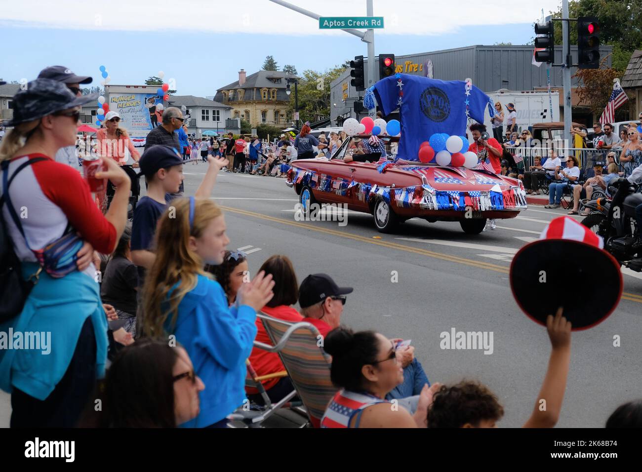 A classic car decorated with the American flags for the independence ...