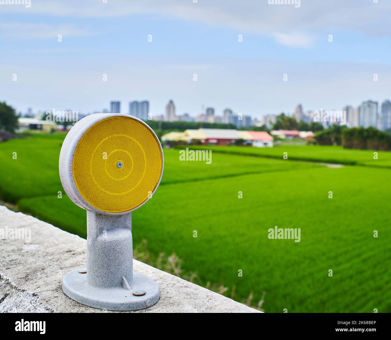 warning sign light near the rice field Stock Photo - Alamy