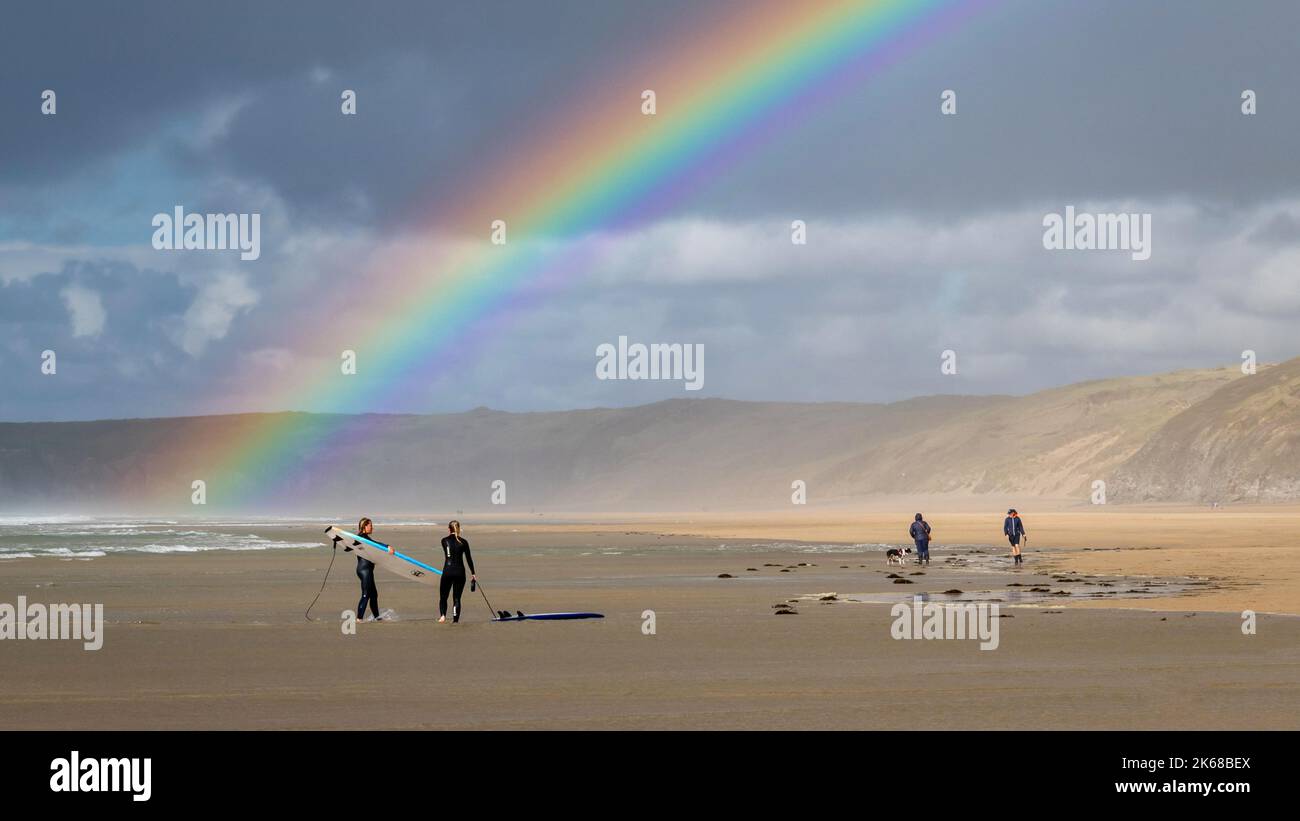 Rainbow on Perranporth beach, Cornwall Stock Photo - Alamy