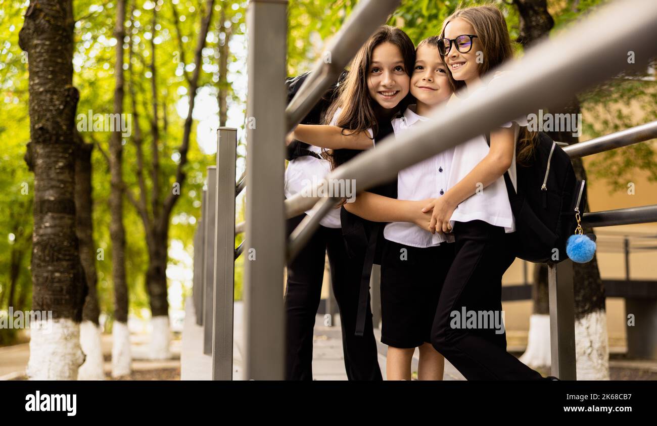 Portrait of Young Kids first day of School. They look very happy and ...