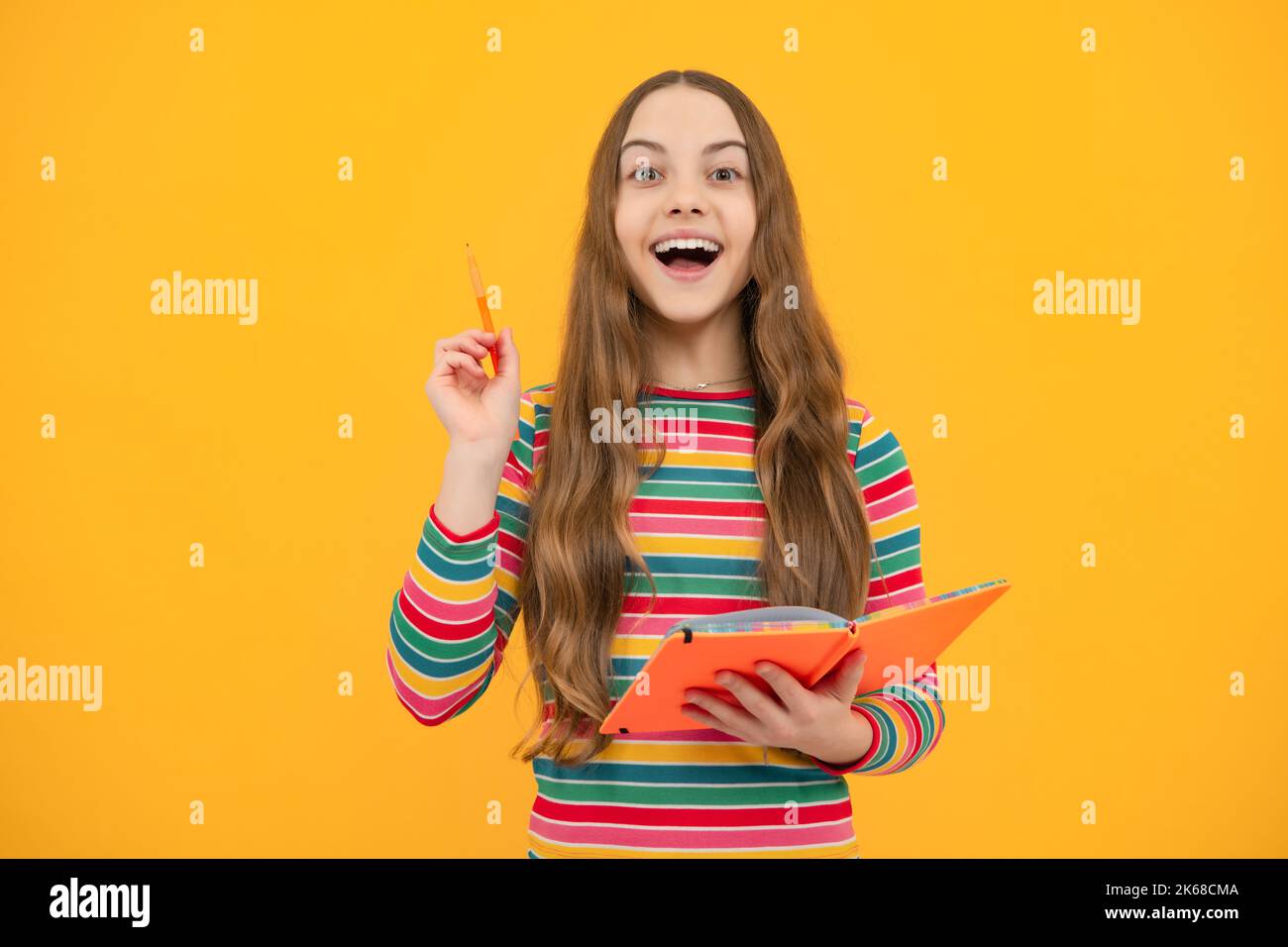 Teenage school girl with books. Schoolgirl student. Excited face ...
