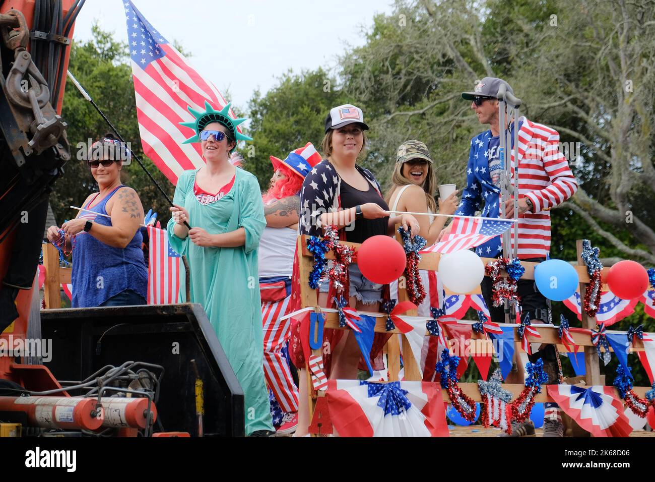 People dressed in creative American symbol costumes in an independence ...