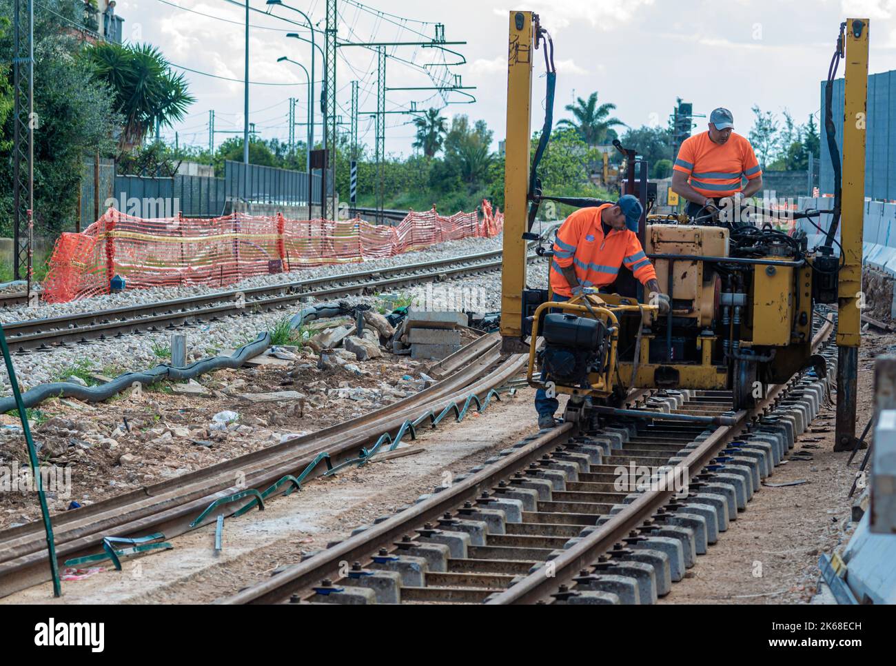 Construction workers at work at Railway station. Construction of a new ...