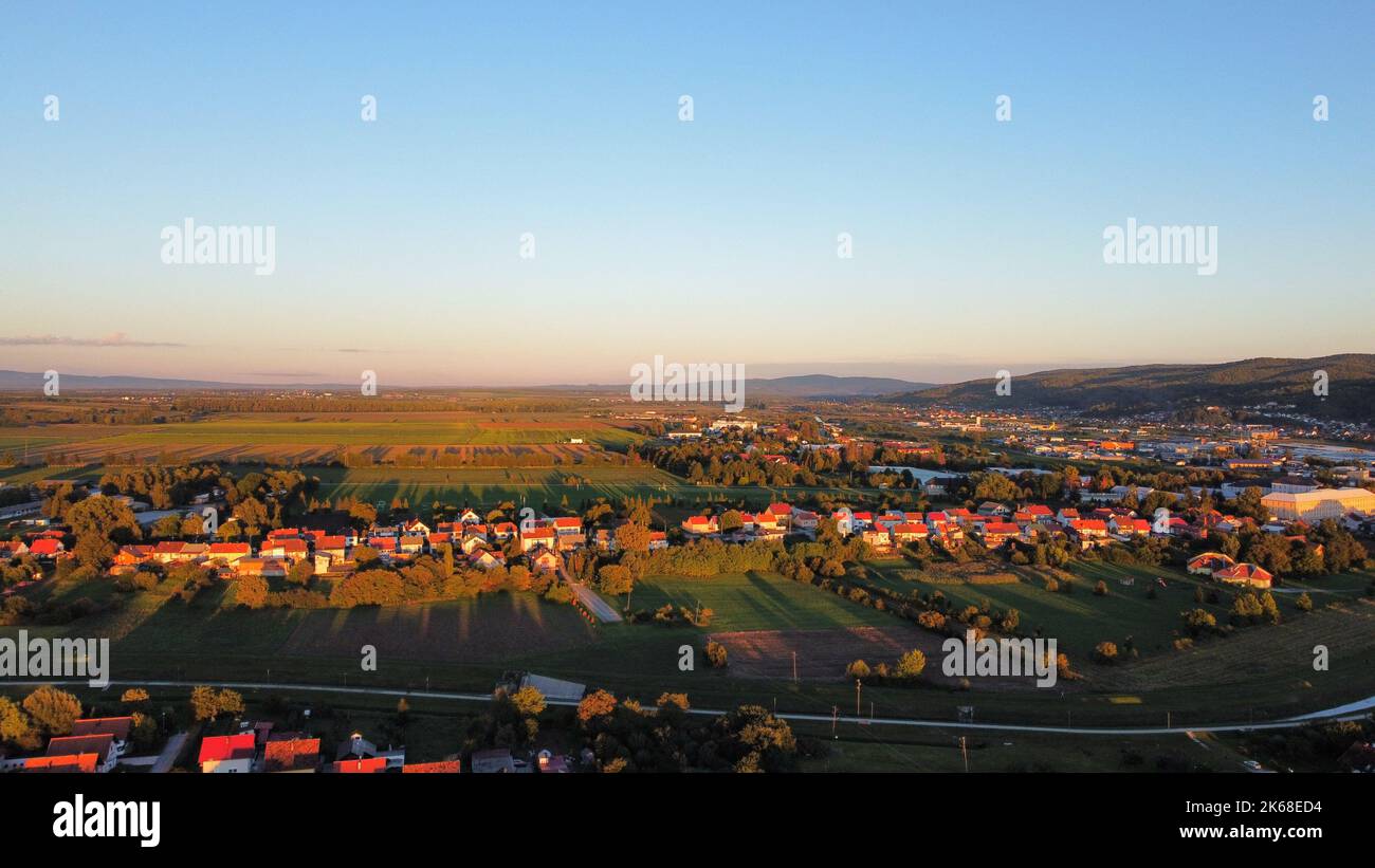 An aerial view of a village and red roof buildings Stock Photo - Alamy
