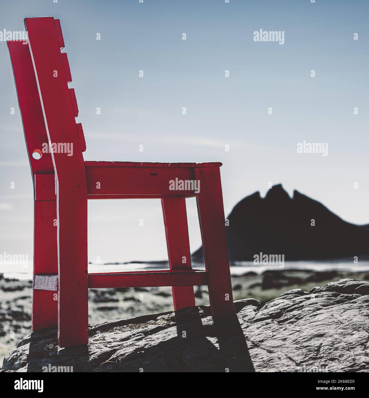 A small red chair in the mountain Stock Photo - Alamy