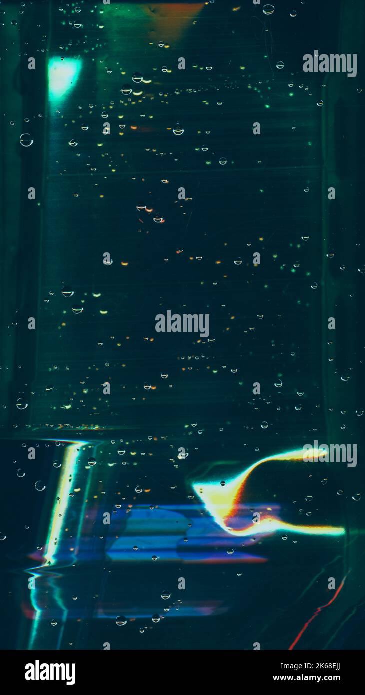 wet glass overlay neon light flare water drops Stock Photo - Alamy