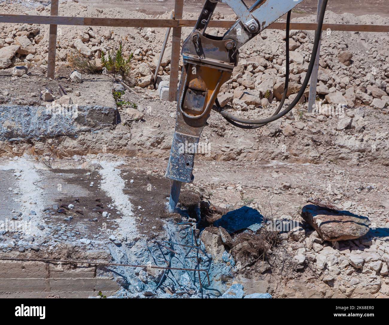 Excavator with demolition hammer in a construction site Stock Photo - Alamy
