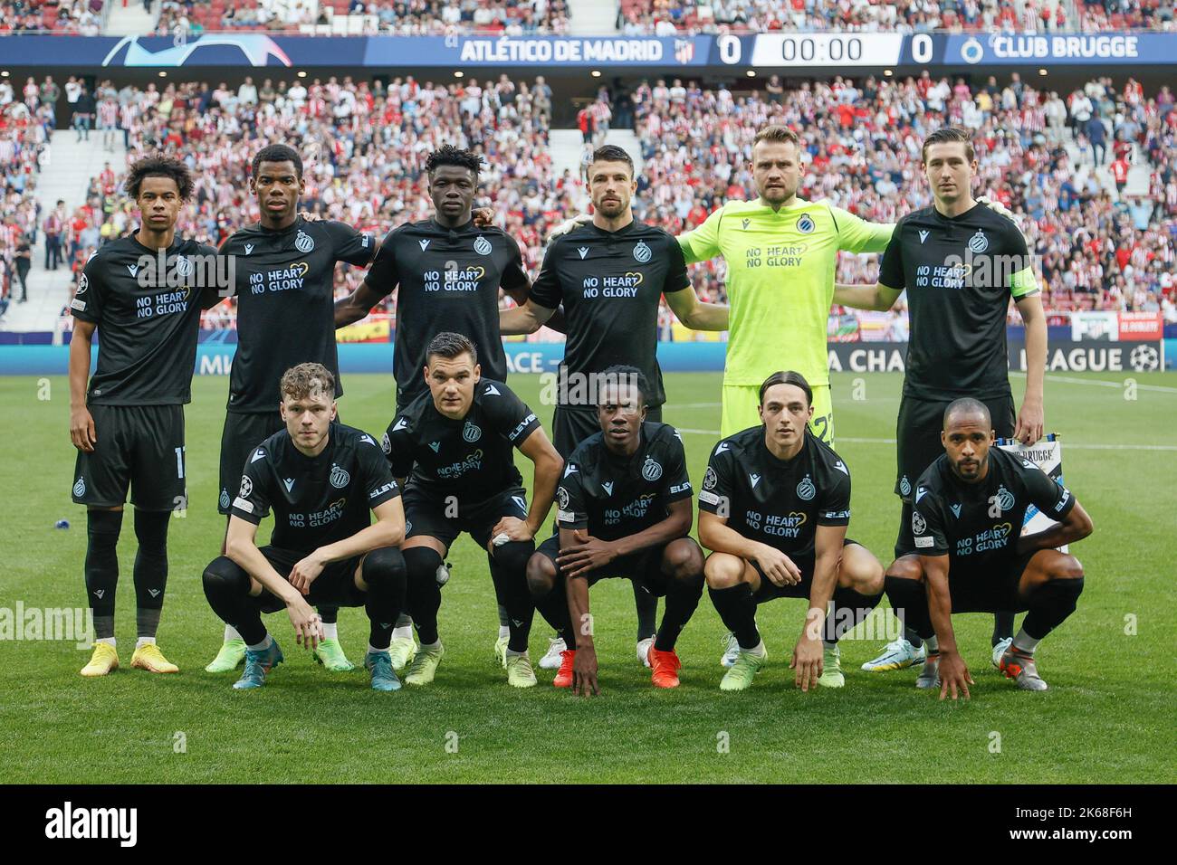 Club's players pictured at the start of a group stage soccer game ...