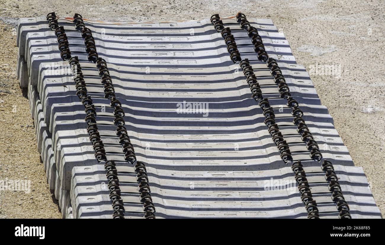 Pile of precast concrete sleepers ready for construction in trackwork ...