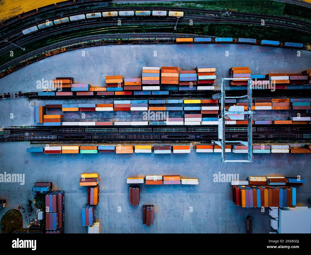 A top view of colorful freight trains on the railway station Stock ...