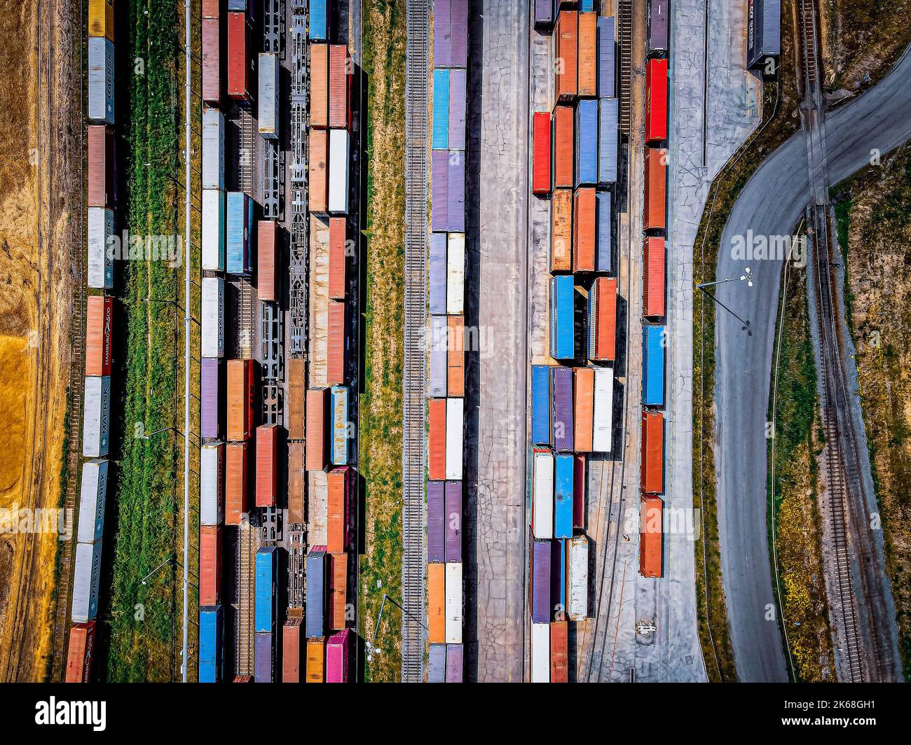 A top view of colorful freight trains on the railway station Stock ...