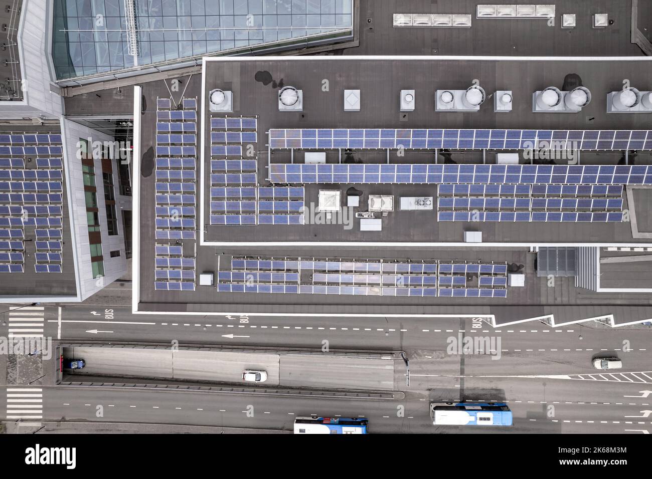 Solar panels on the roof of a shopping mall building Stock Photo - Alamy