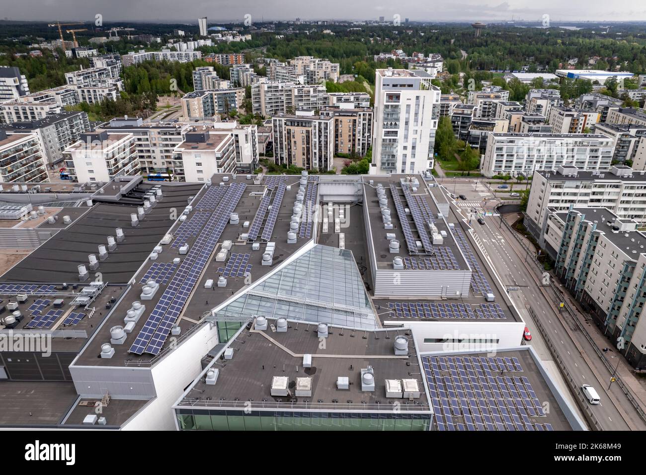 Solar panels on the roof of a shopping mall building Stock Photo - Alamy