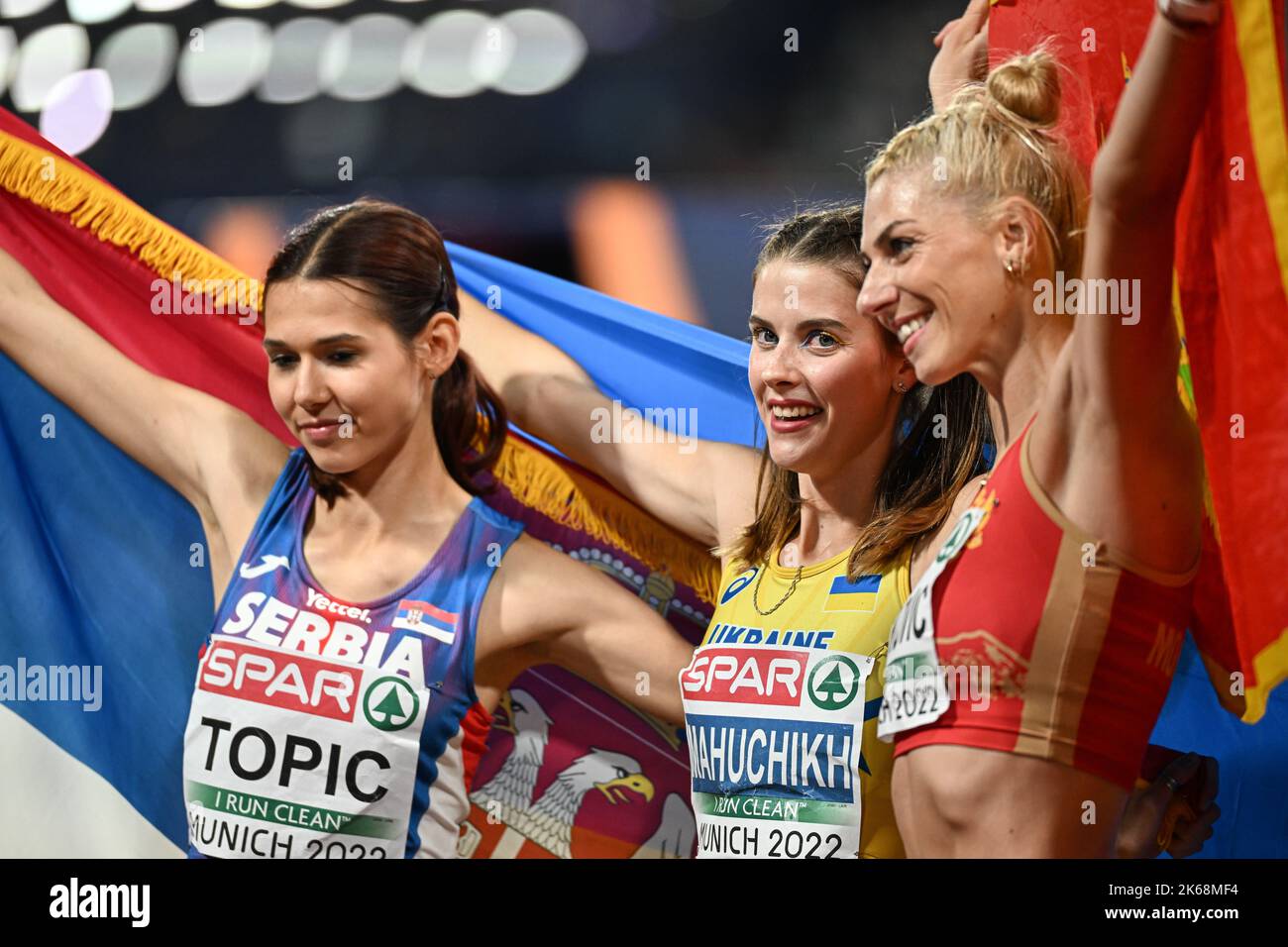 Angelina Topić ,Marija Vuković ,Yaroslava Mahuchikh with her country's ...