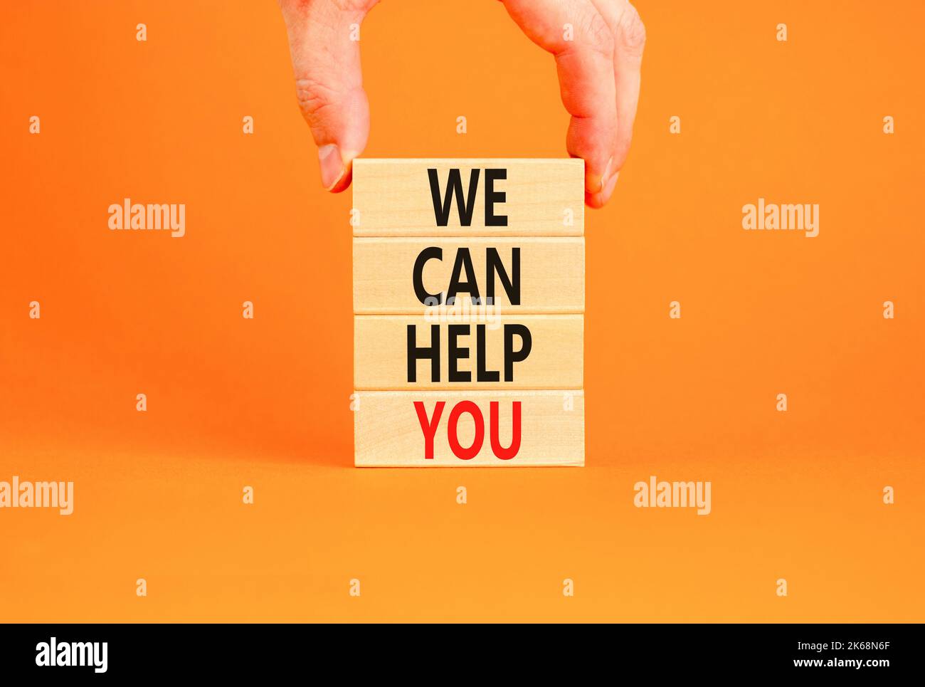 Support and we can help you symbol. Concept words We can help you on wooden blocks. Beautiful ...