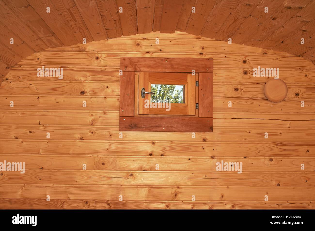 Wooden window on a wooden wall close up Stock Photo - Alamy