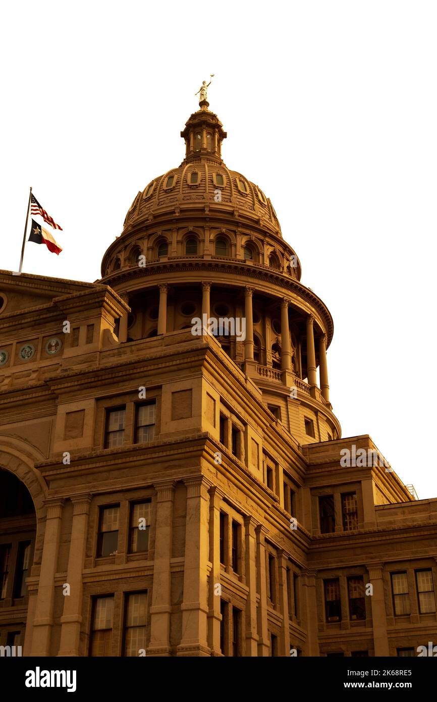 A vertical shot of the beautiful Texas Capitol dome with the US and ...