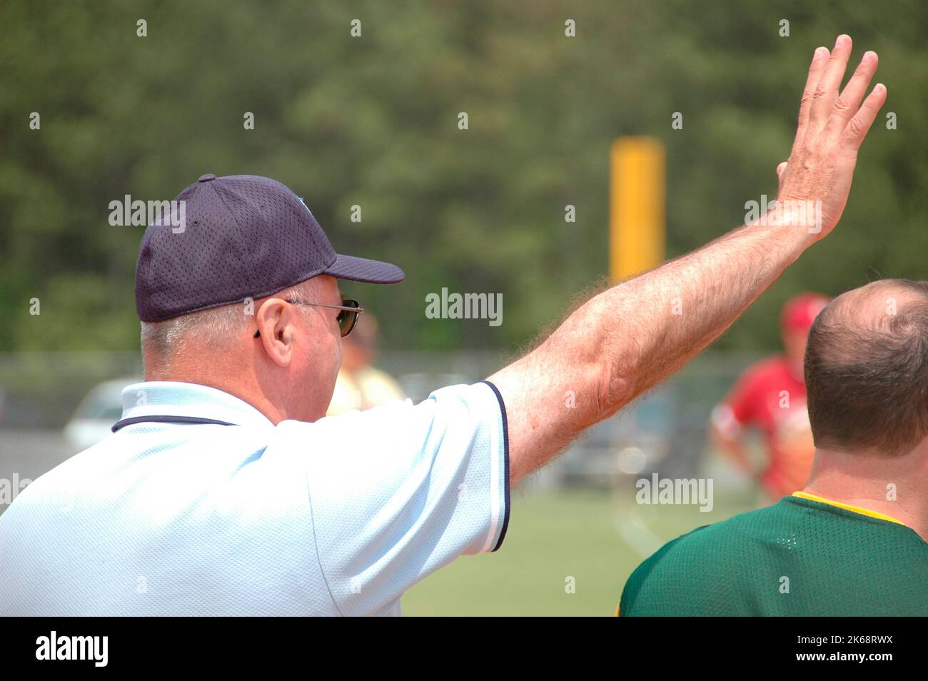 softball umpires for ASA in the US during games making calls and in ...