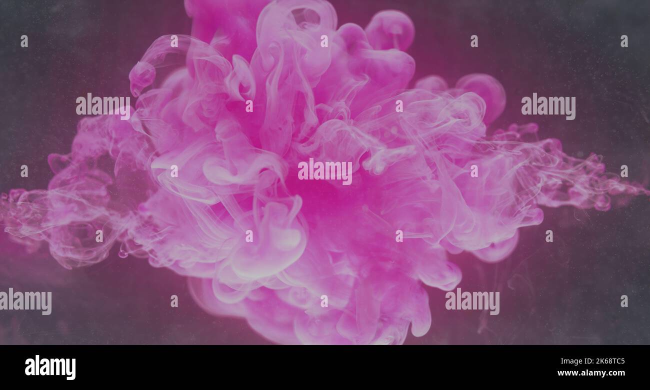 color explosion ink water splash pink mist cloud Stock Photo - Alamy