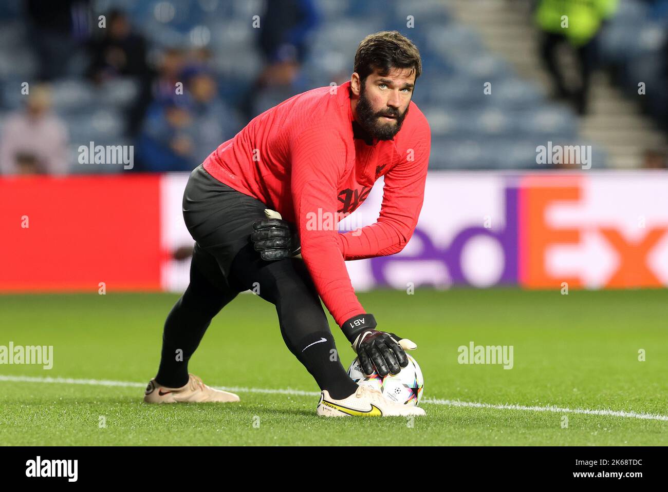 Liverpool goalkeeper Alisson Becker warms up before the UEFA Champions ...