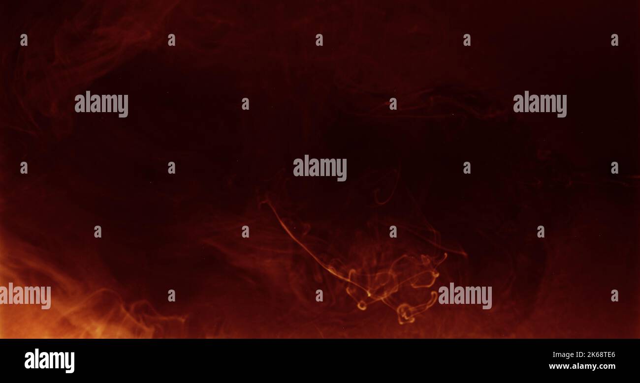 color vapor cloud burning background orange red Stock Photo - Alamy