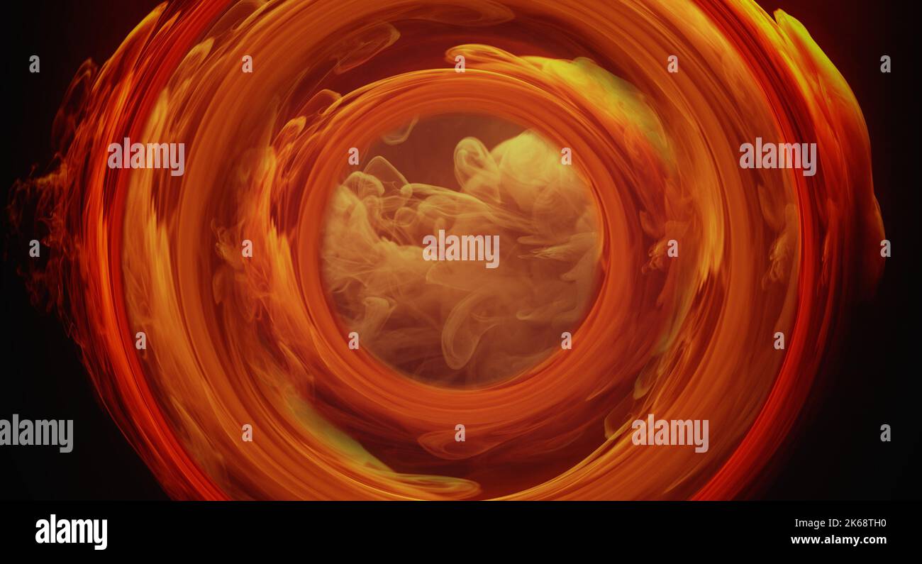 color smoke circle ink water swirl orange tunnel Stock Photo - Alamy