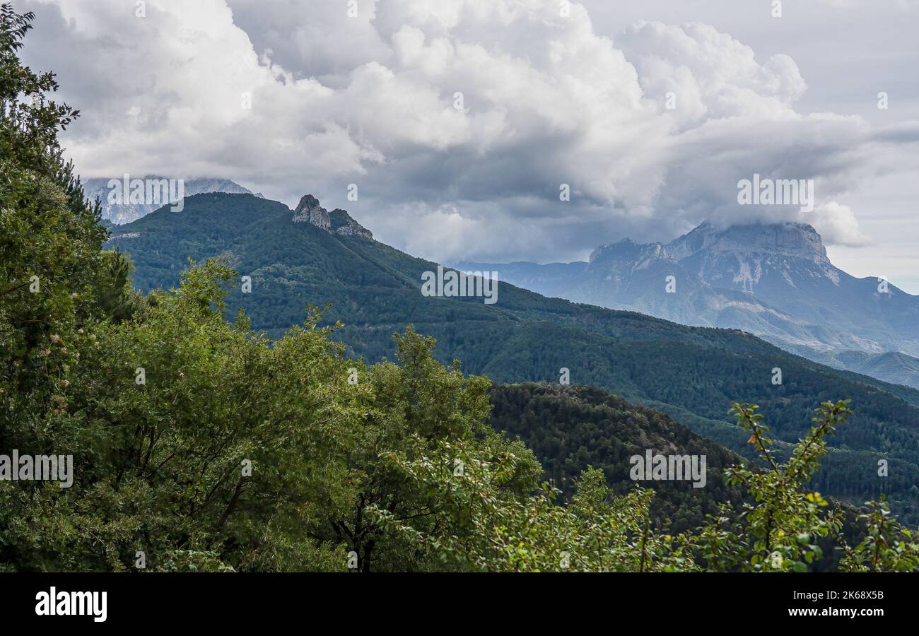 magnificent view of Spanish Pyrenees mountains with cloud bubbling over ...