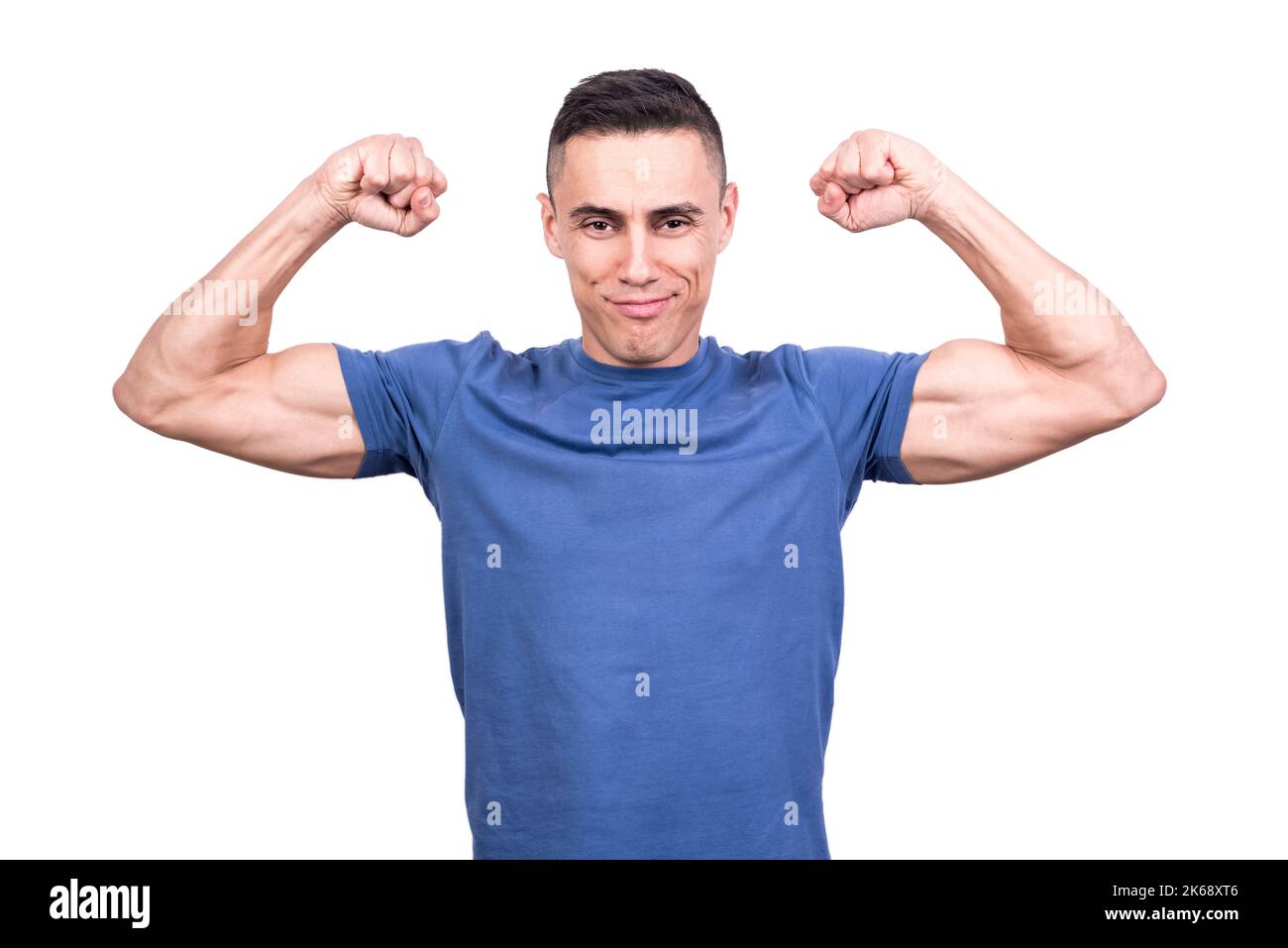 Portrait of a strong man showing off the biceps Stock Photo - Alamy